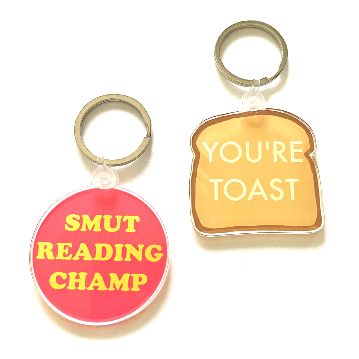 Smut Reading Champ Acrylic Keychain The Silver Spider