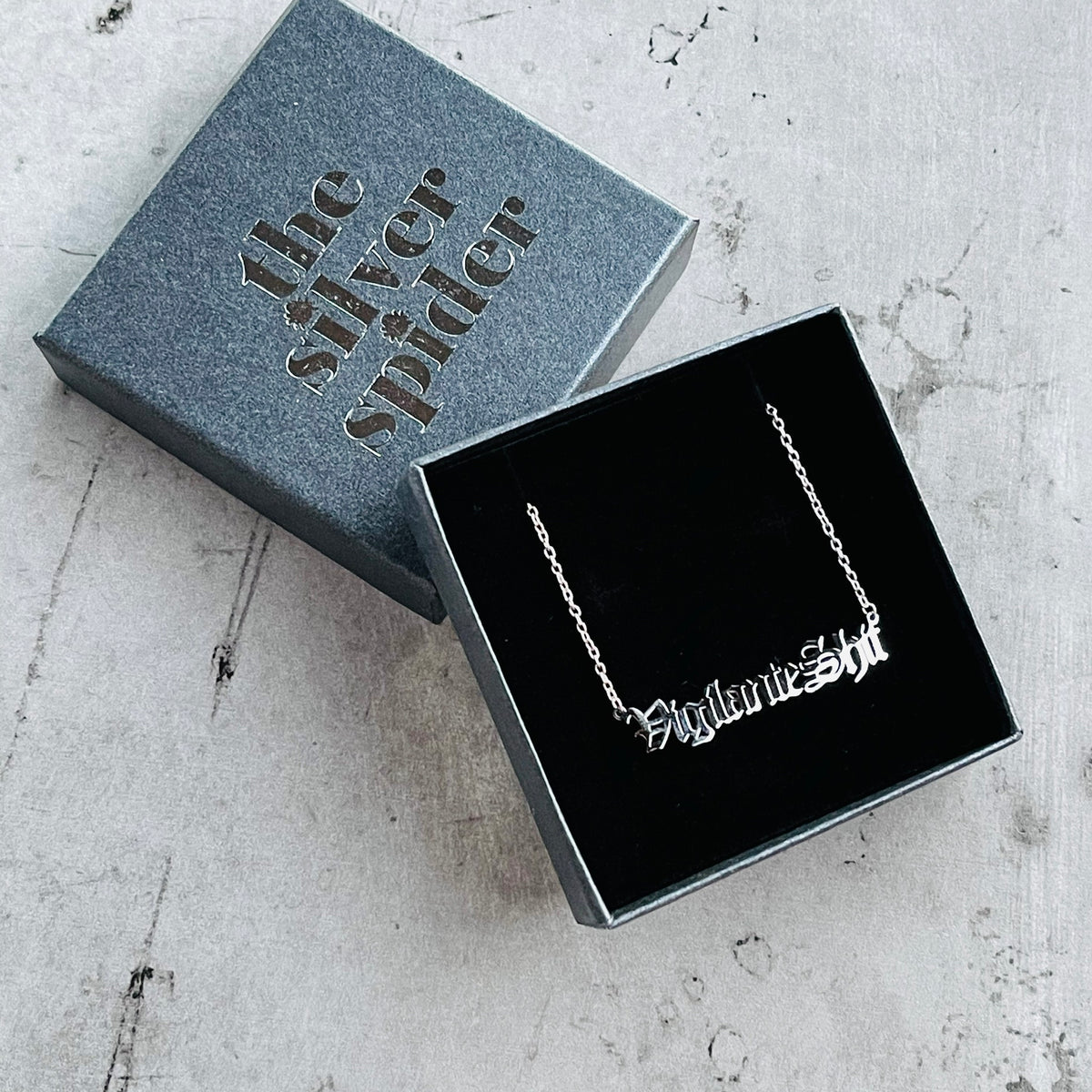 Vigilante Shit Necklace – The Silver Spider