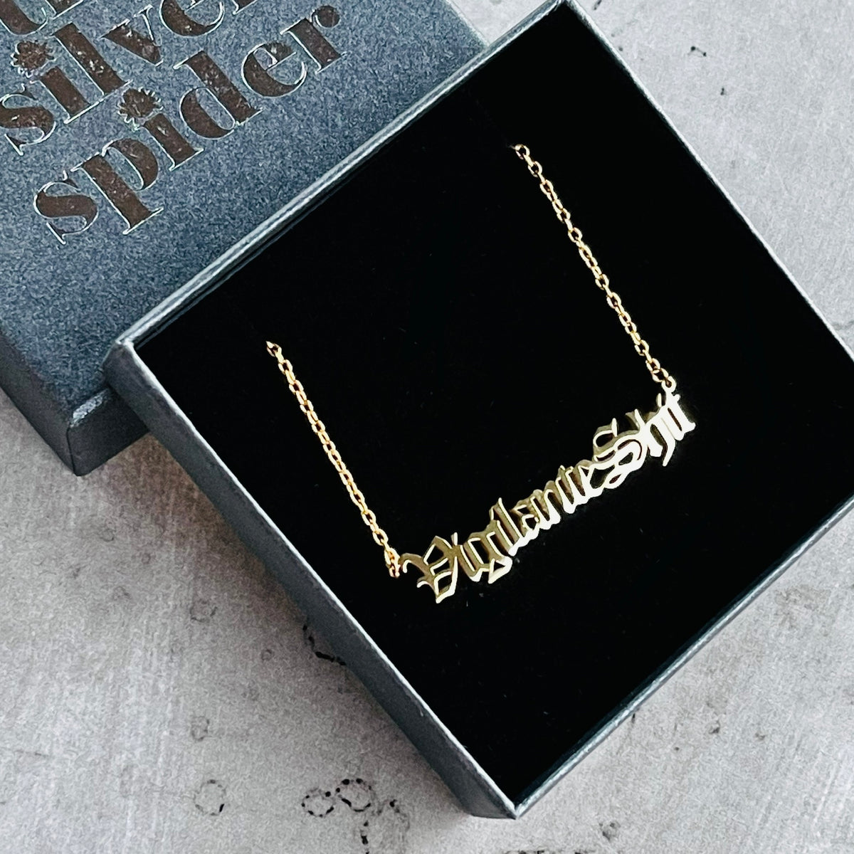 Vigilante Shit Necklace – The Silver Spider