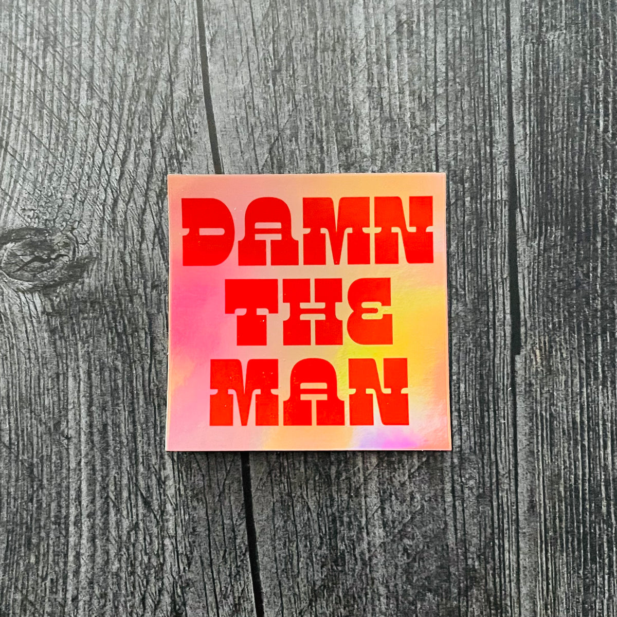 Damn the Man Holographic Sticker – The Silver Spider
