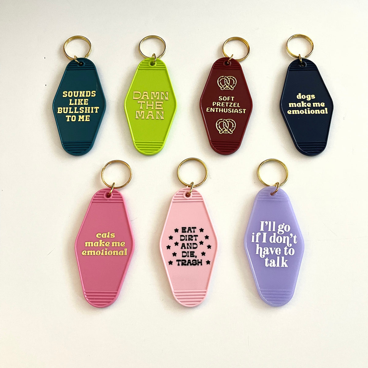 Damn the man hotel Motel Keychain – The Silver Spider